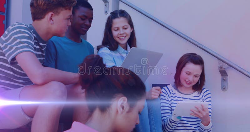 Animation of Lights Over Group of Happy Diverse Students Using Tablets ...