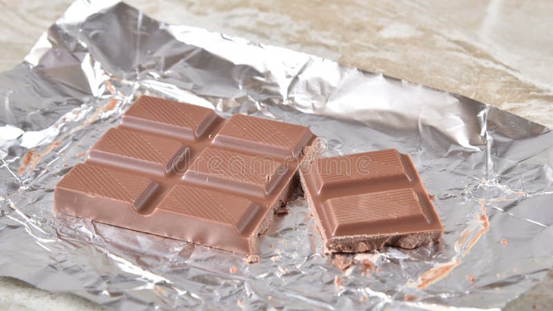 Animation of a Milk Chocolate Bar Vanishing from the Wrapper Stock ...