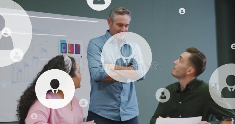 Animation of Multiple Profile Icons Floating Over Diverse Colleagues ...