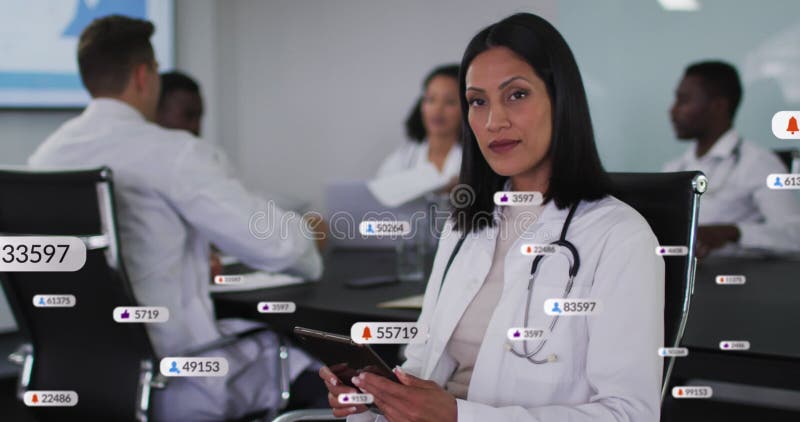 Animation of Social Media Data Processing Over Biracial Female Doctor Using Tablet Stock Video ...