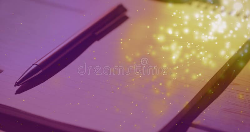 Animation of Sparkles Over Notepad and Pen Stock Footage - Video of ...