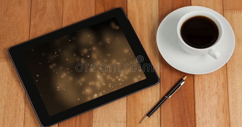 Animation of Tablet with Light Trails on Screen and Cup of Coffee on ...