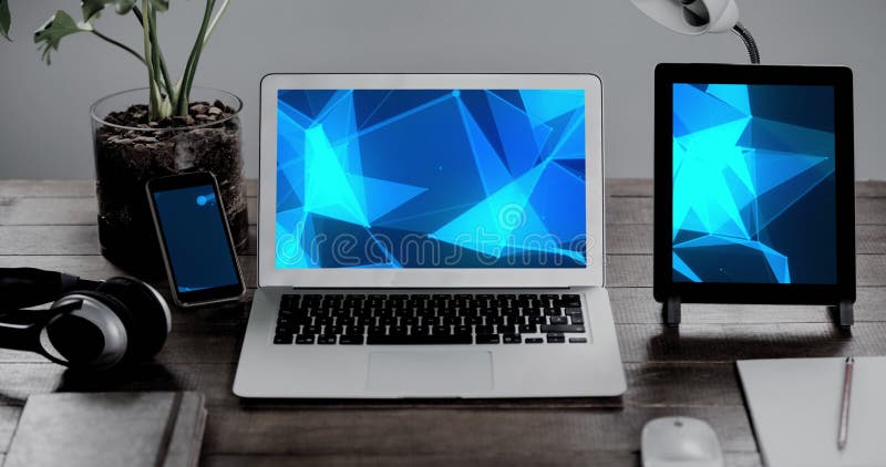Animation of Technological Devices with Blue Shapes on Screen on Desk ...