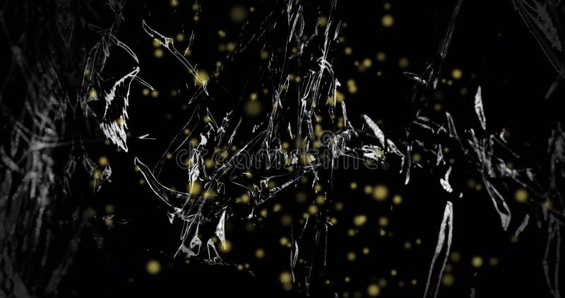 Animation of Yellow Particles Floating Over Light on Moving Shiny Black ...