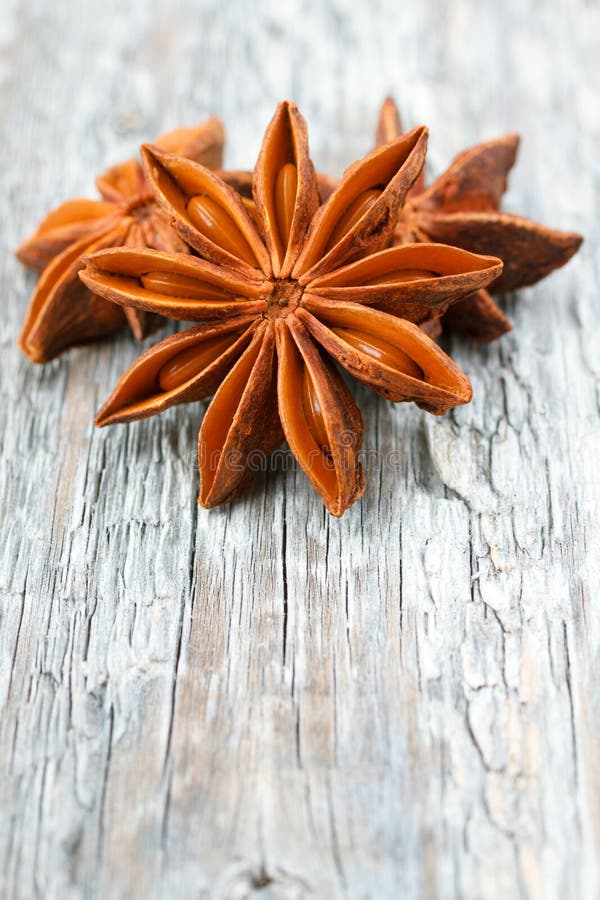 Anise Stars on a Wodden Table Stock Photo - Image of decoration, star ...