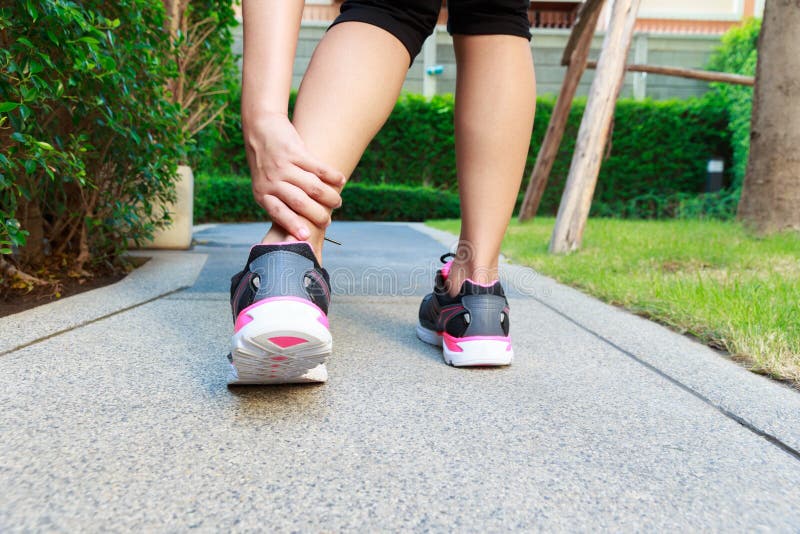 Ankle Sprain while Jogging or Running Stock Photo - Image of ankle ...