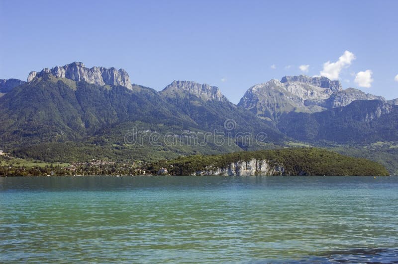 Annecy lake and mountains stock image. Image of france - 21077763
