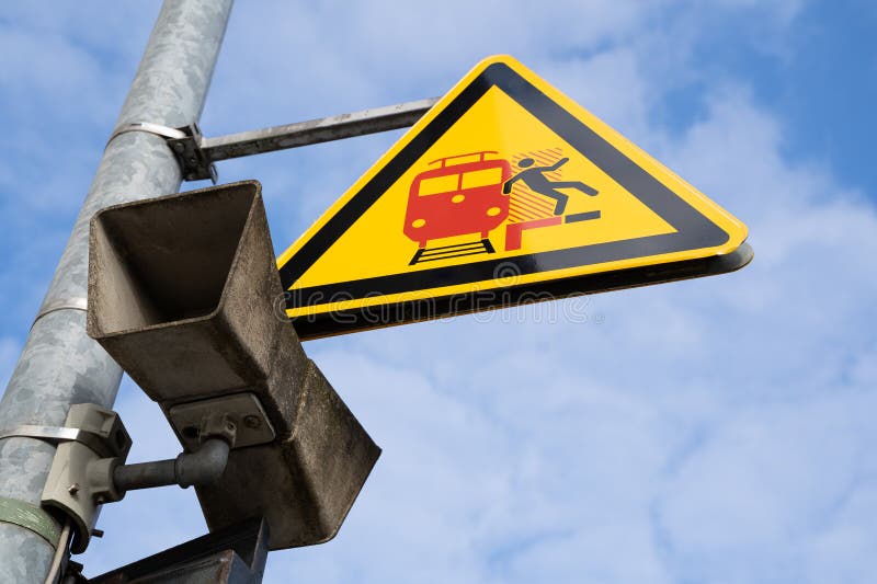 Announcement Speaker and Triangular Warning Sign for Passengers on a ...