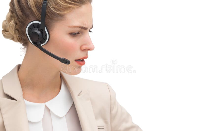Annoyed call center agent stock image. Image of blonde - 31551021