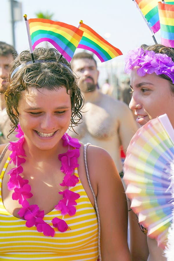 Parade Of Lesbians And Gays Lesbians Walking In The Gay Pride Parade