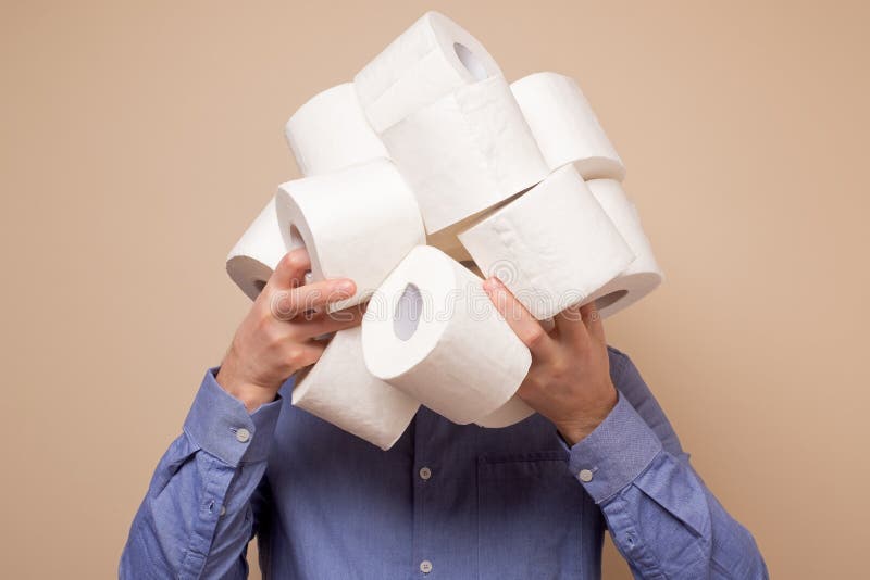 Anonym Man Stocking Up Toilet Paper at Home Being Afraid of Coronavirus ... Anonym Man Stocking Up Toilet Paper at Home Being Afraid of Coronavirus ...