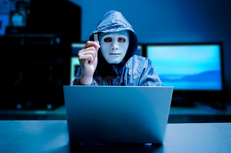 Anonymous Computer Hacker in White Mask and Hoodie. Obscured Dark Face ...