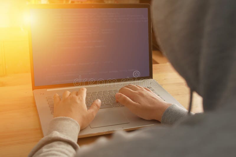 Anonymous Computer Programmer or Hacker Working Typing on Laptop Stock ...