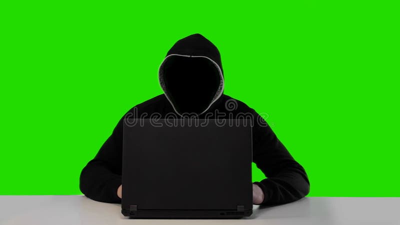 Anonymous Hacker in Black Hood with a Laptop Stock Video - Video of ...