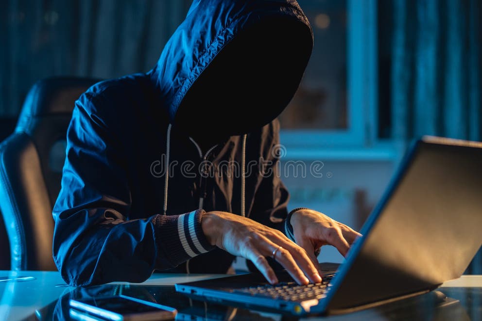Anonymous Hacker Programmer Uses a Laptop To Hack the System in the ...
