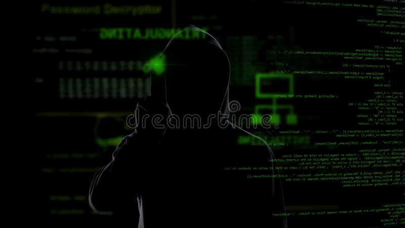 Anonymous Hacker Typing Code on Multiple Computer Screens in Dark Room ...