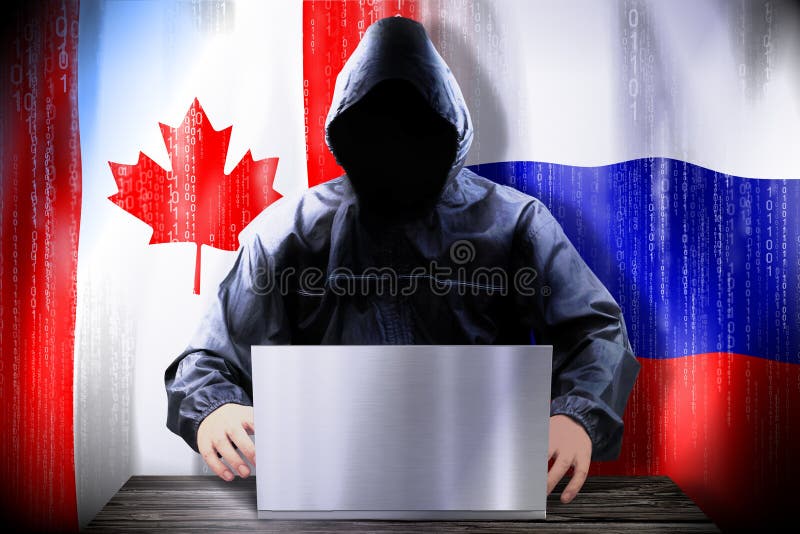 Anonymous Hacker Working on a Laptop, Flags of Canada and Russia Stock ...