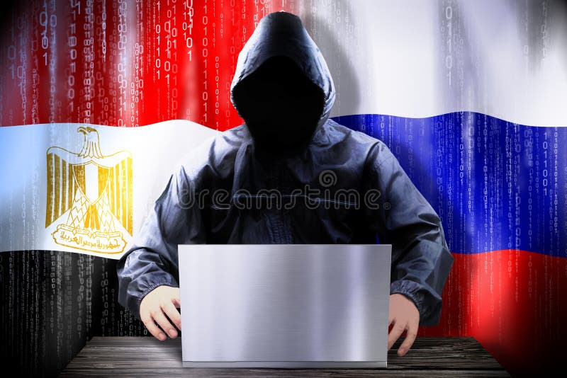 Anonymous Hacker Working on a Laptop, Flags of Egypt and Russia Stock ...