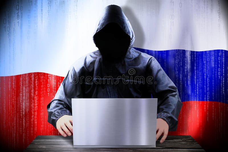 Anonymous Hacker Working on a Laptop, Flags of Poland and Russia Stock ...