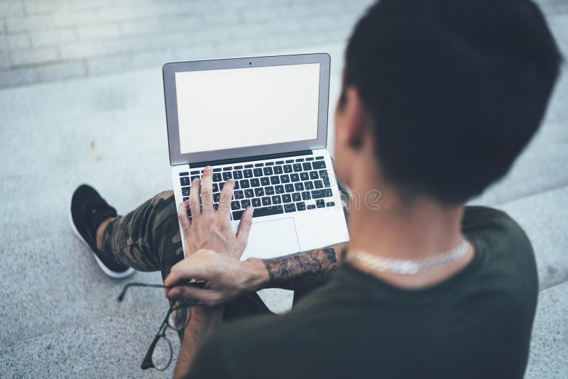 Anonymous Male Remote Worker Using Keyboard of Blank Screen Laptop ...