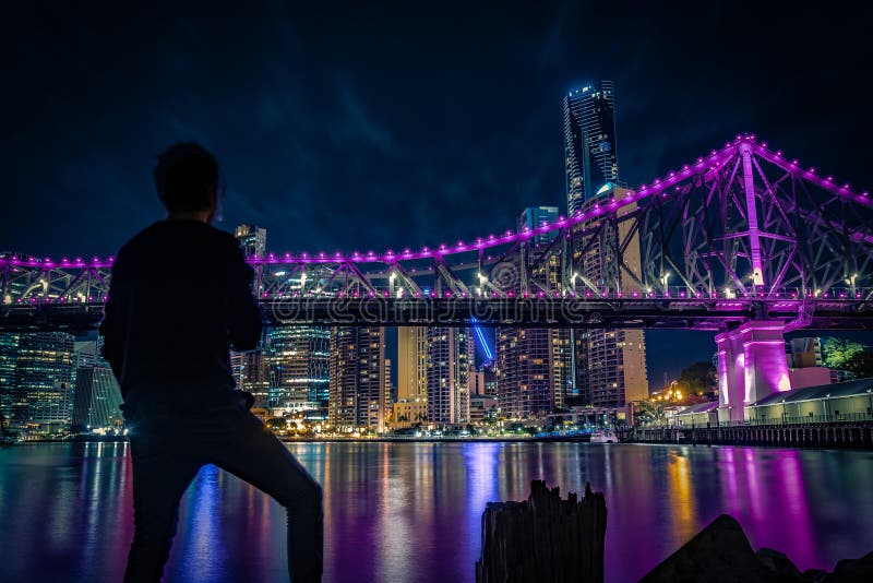 Anonymous Man Looking at Bridge and Metropolis at Night Editorial Stock ...