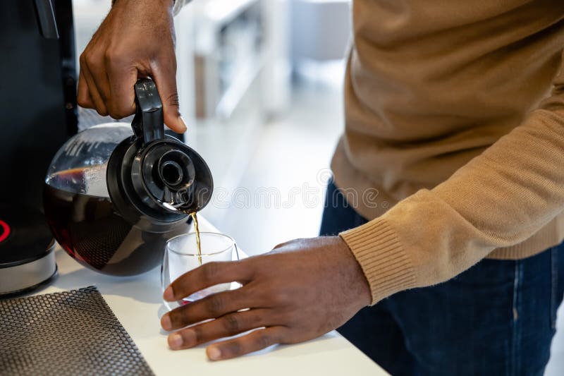 Anonymous Man Worker Making a Cup of Hot Coffee in the Office Kitchen ...