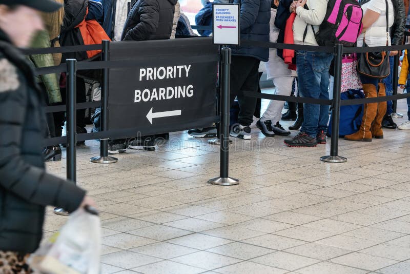 Departure and Priority Lane Board Sign at International Airport Stock ...