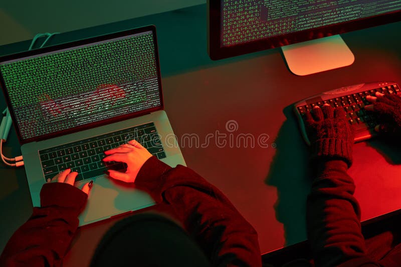 Anonymous People Using Computer And Programming To Break Code Cyber