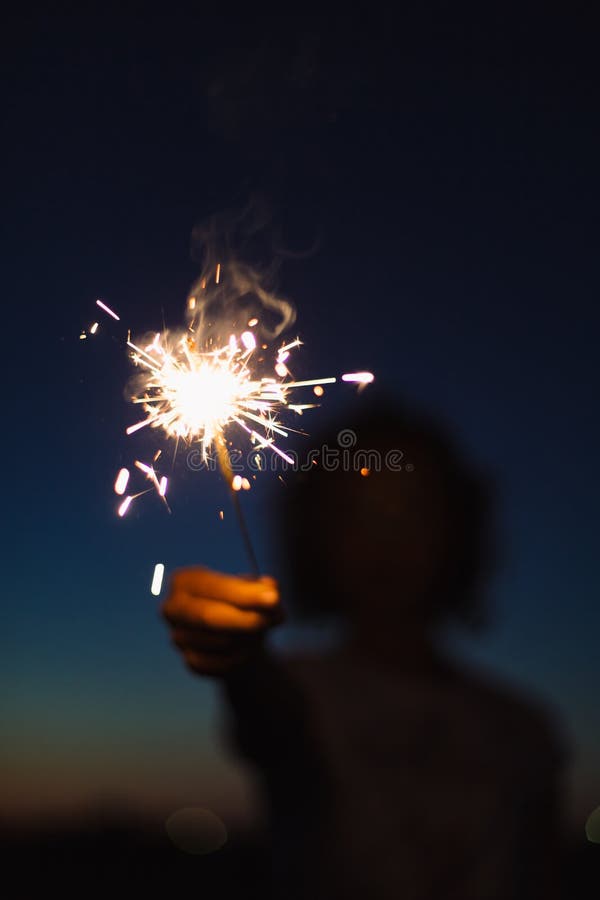 Anonymous Person with Burning Firework Stock Image - Image of ...