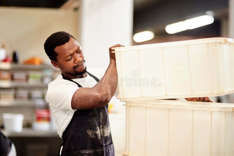 Another Day, Another Bake. a Young Man Working in a Bakery. Stock Image ...