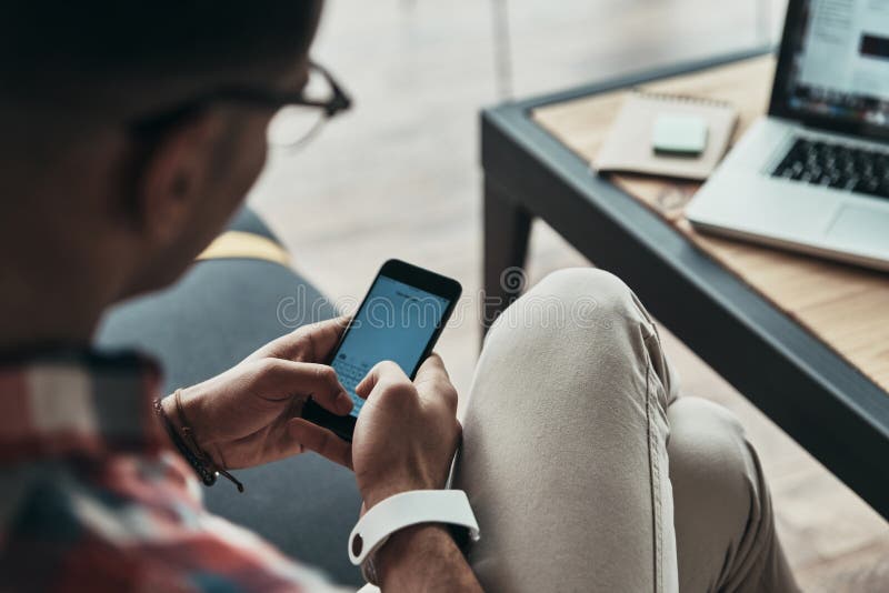 Another Message. Close Up Top View of Young Man Using His Smart Stock ...