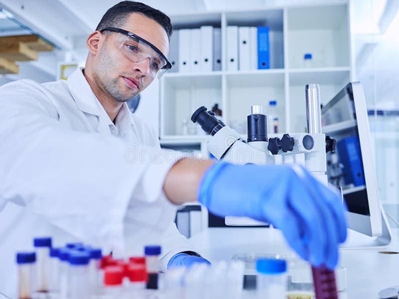 Another One Ready for Testing. a Handsome Young Male Scientist Working ...