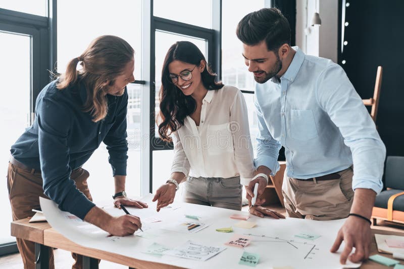 Another Project. Group of Young Confident Business People Working ...