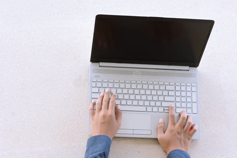 Another Top-down Perspective of Hands on a Laptop Keyboard, Emphasizing ...