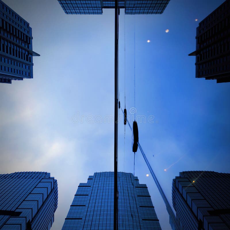 Blue Sky and Skyscrapers in Windows Reflection Stock Image - Image of ...