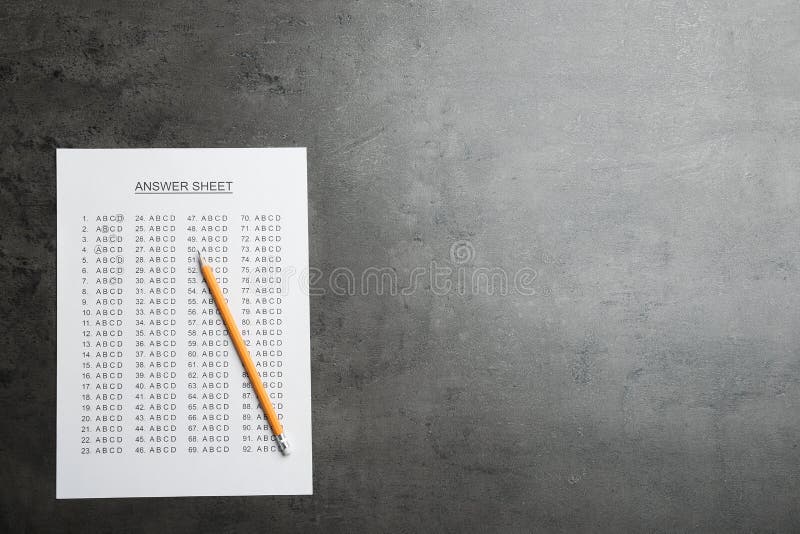 Answer Sheet and Pencil on Grey Background, Top View Stock Image ...