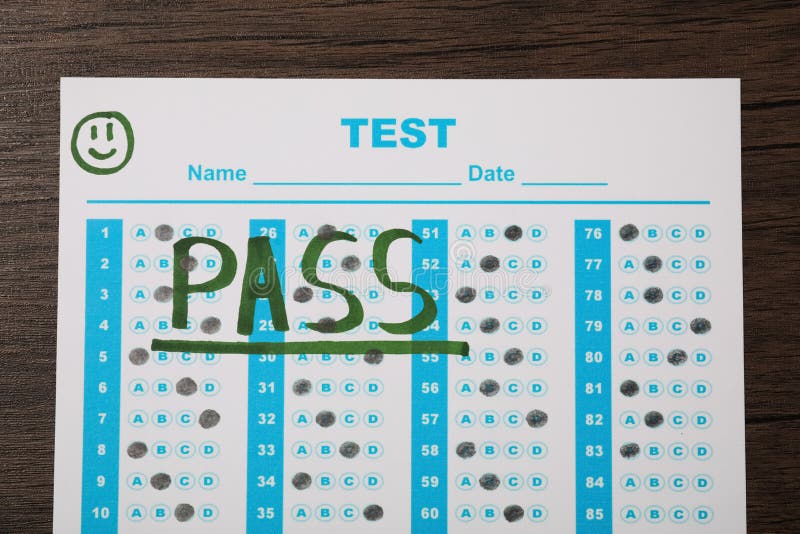Answer Sheet with Word Pass on Wooden Table, Top View. Student Passing ...
