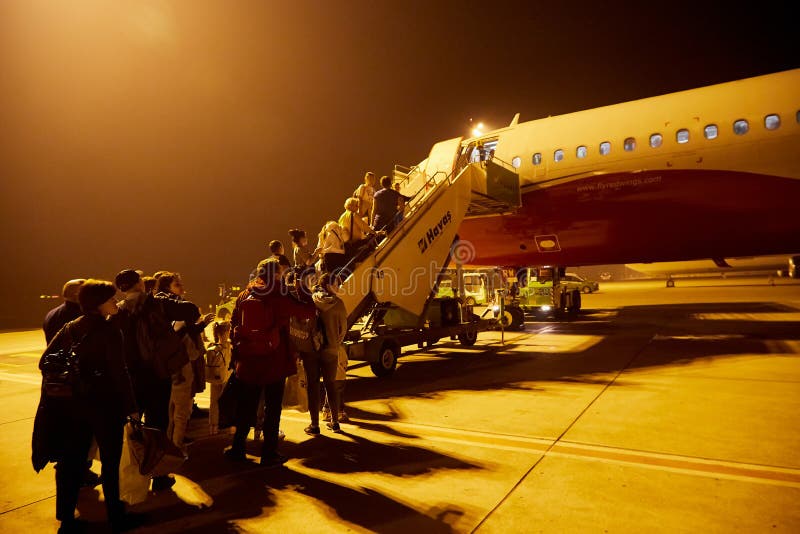 Plane at night editorial image. Image of night, arrival - 7303275