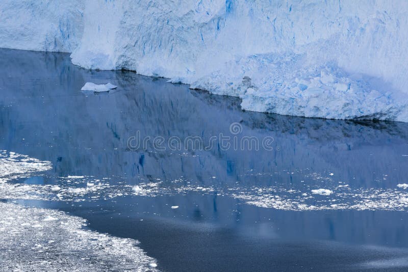 Antarctic Ice, Snow and a Reflection Stock Photo - Image of coastal ...
