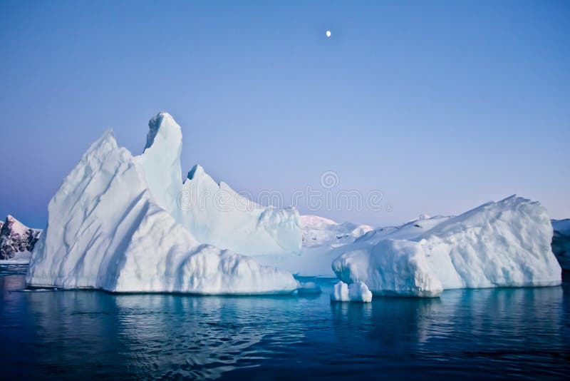 Iceberg during Sunrise with Backlight by Sunrays. Stock Image - Image ...