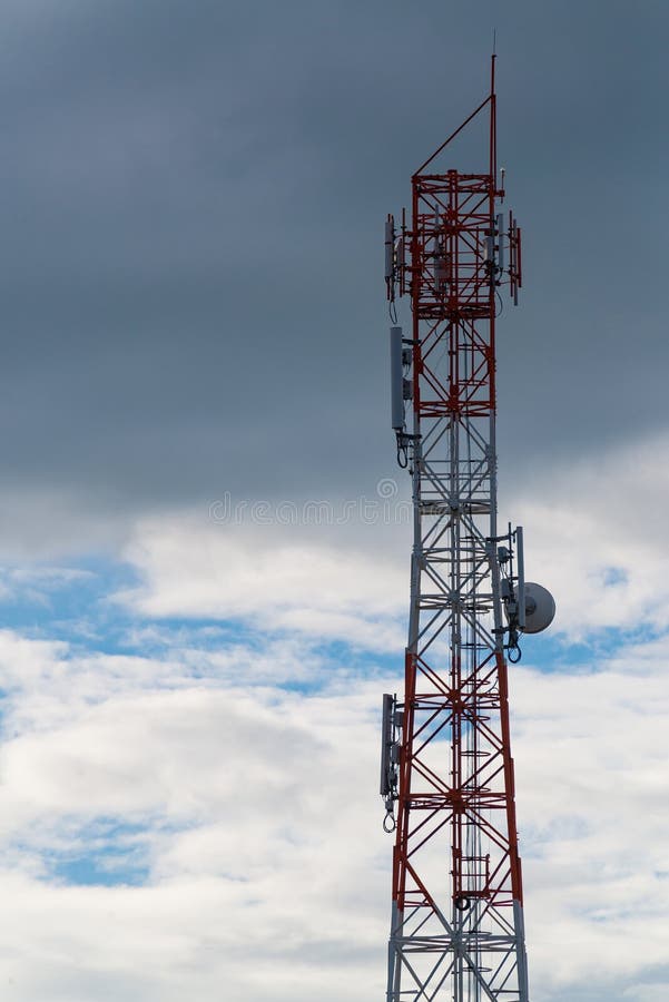 Antenna of Cellular and Communication System Tower with the Blue Stock ...