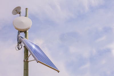 Antenna Repeater with Solar Panel Stock Image - Image of blue ...
