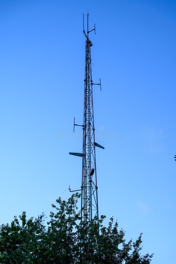 Antenna Tower Against Blue Sky with Directional and Omnidirectional ...
