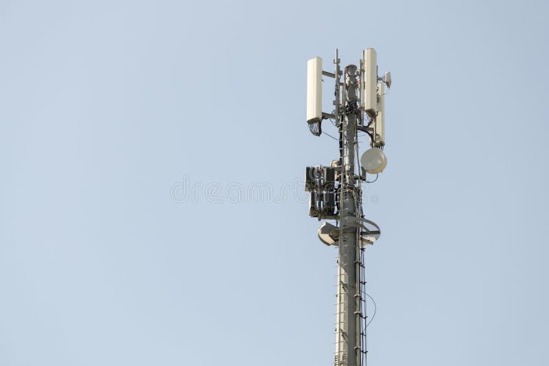 Antennas and Electronic Communications Equipment on Top of a Tower Form ...