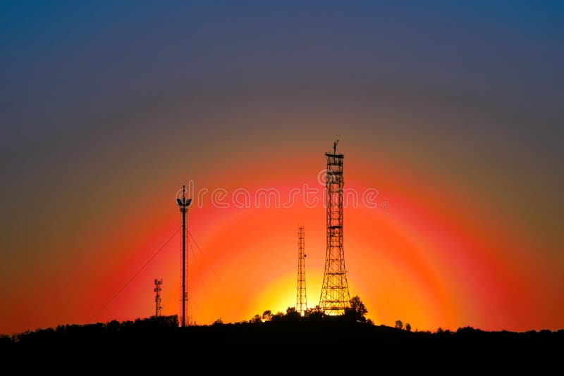 Antennas at sunset stock image. Image of electricity - 122232435