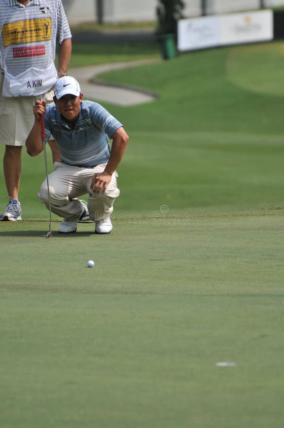 Anthony Kim and Caddy editorial image. Image of tour, anthony - 8159425