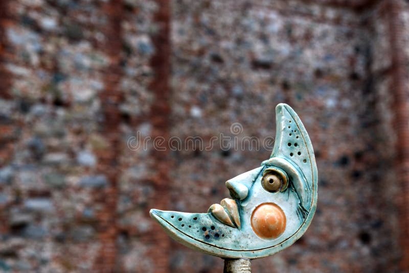 An Anthropomorphic Slice of Moon on a Bokeh Background Stock Photo ...