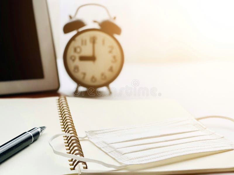 Anti Virus Protection Mask on Open Notebook Paper, Digital Tablet and ...