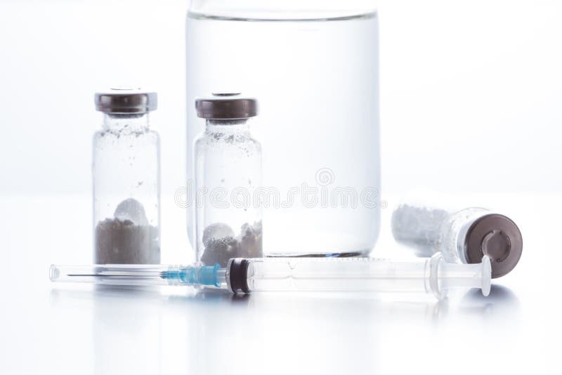 Antibiotic Injection Bottles with a Plastic Disposable Syringe on a ...