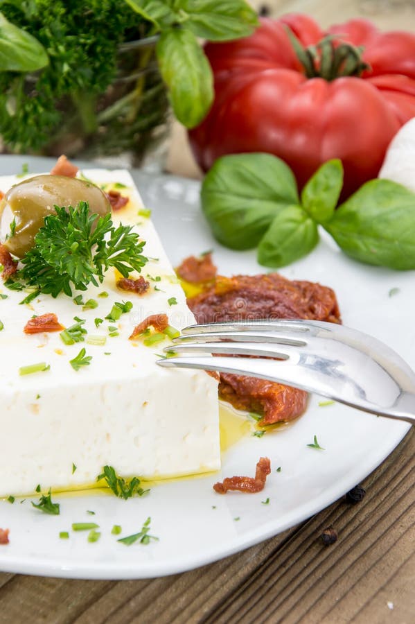 Antipasti (Feta Cheese) on a Small Plate Stock Photo - Image of ...